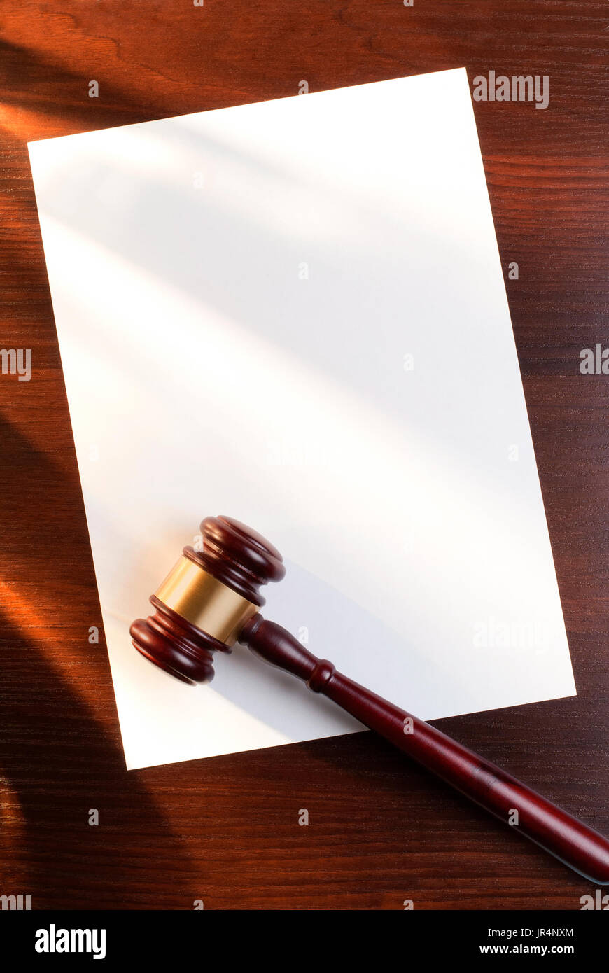 judges gavel on the table and a sheet of paper for the contract Stock ...