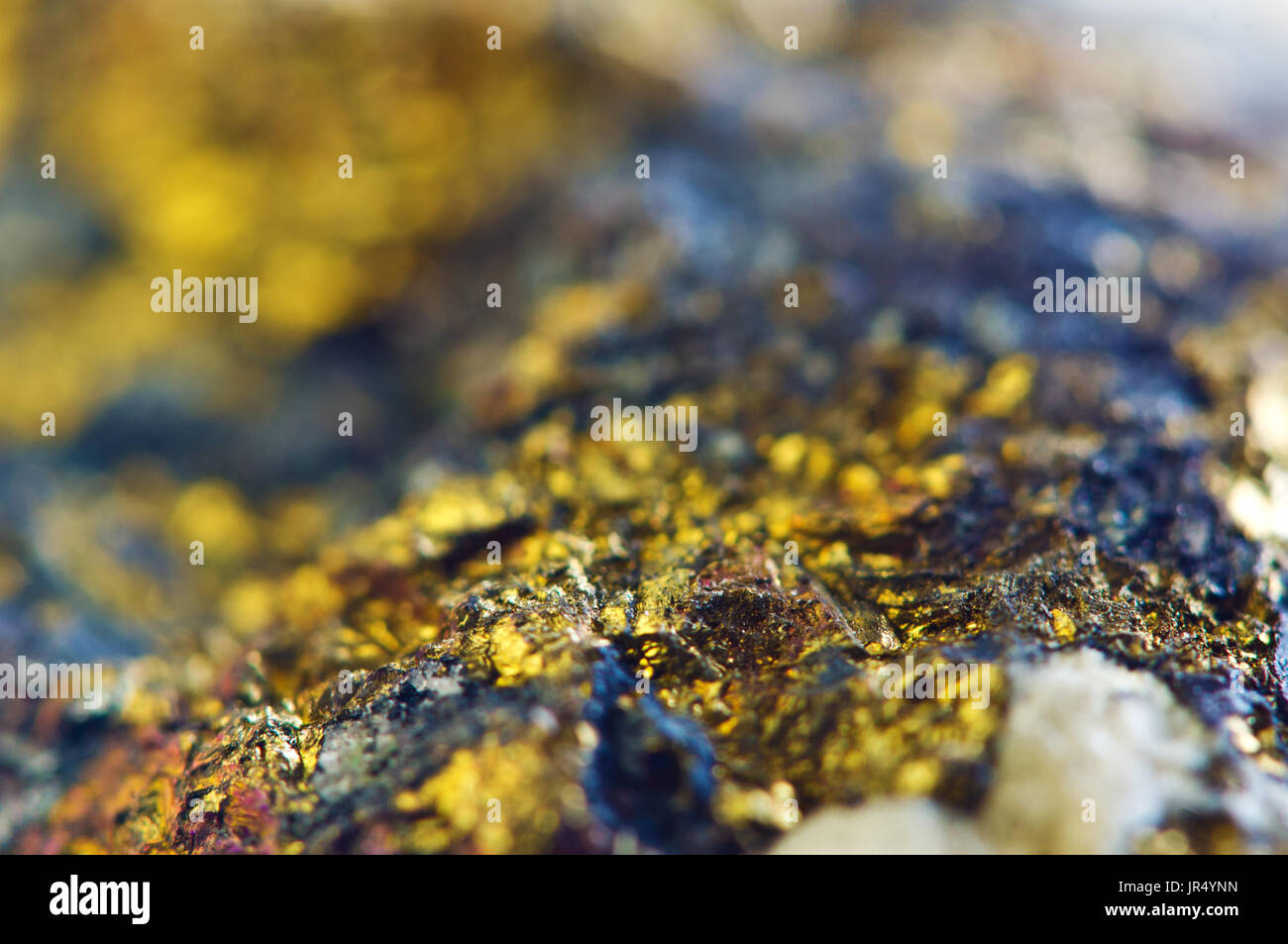 Golden Abstract background from natural mineral. Macro Stock Photo - Alamy