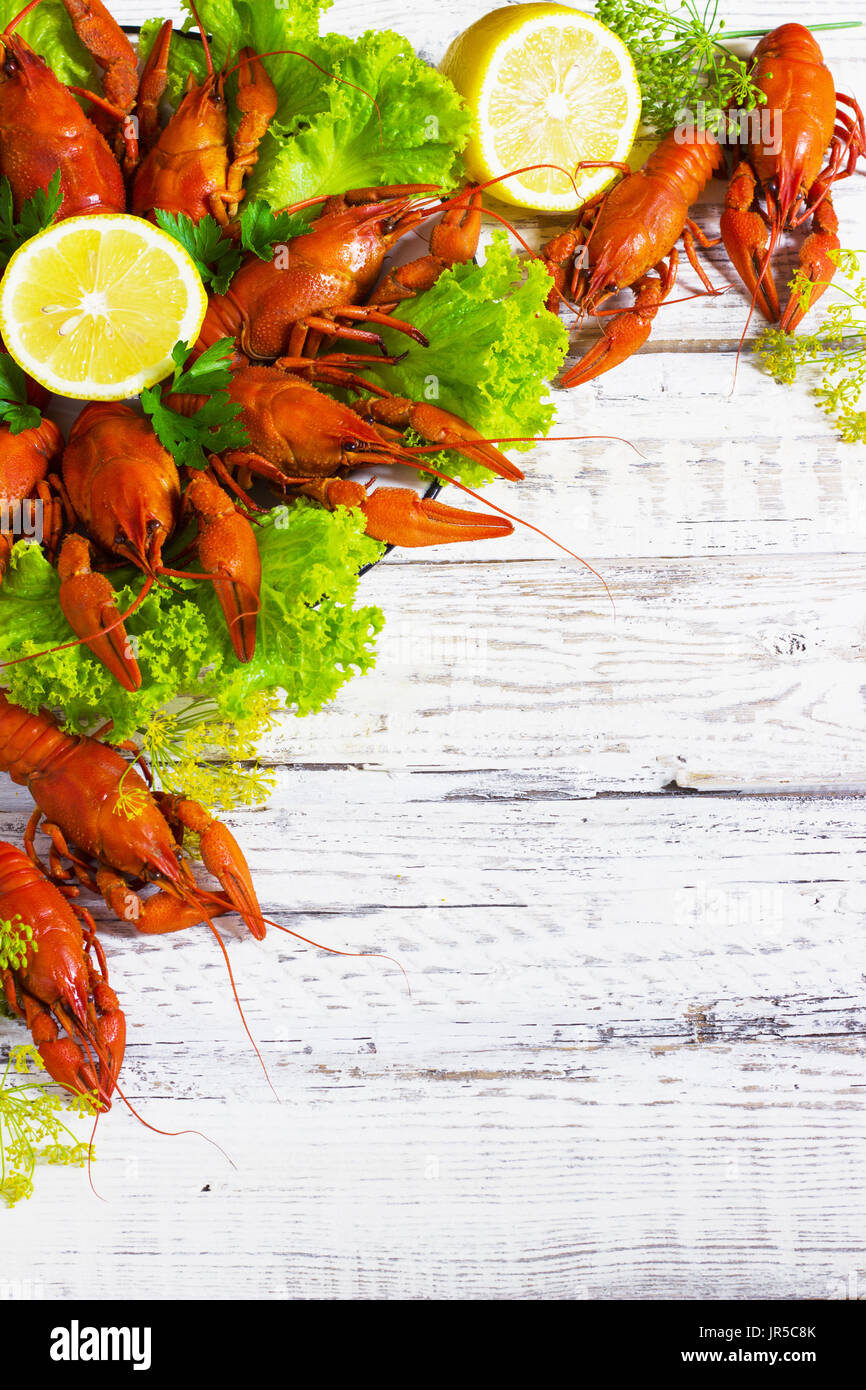 crawfish on wooden white background in a plate Stock Photo - Alamy
