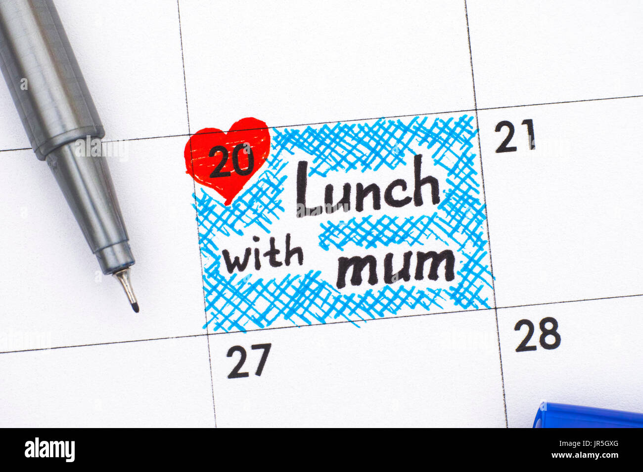 Reminder Lunch with Mum in calendar with blue pen Stock Photo - Alamy