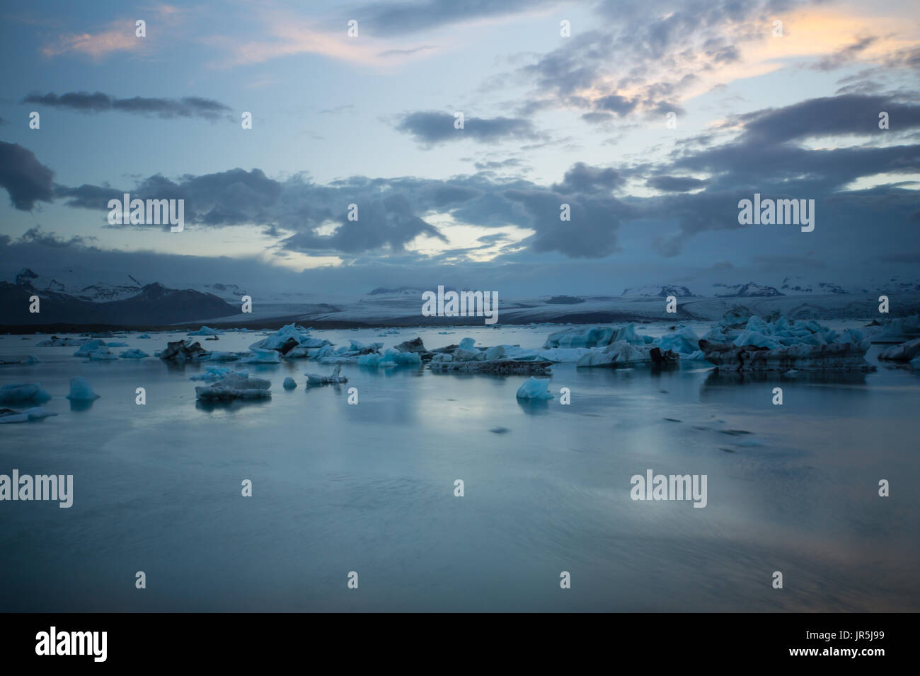 Iceland - Turquoise ice floes moving to the ocean in glacier lagoon ...