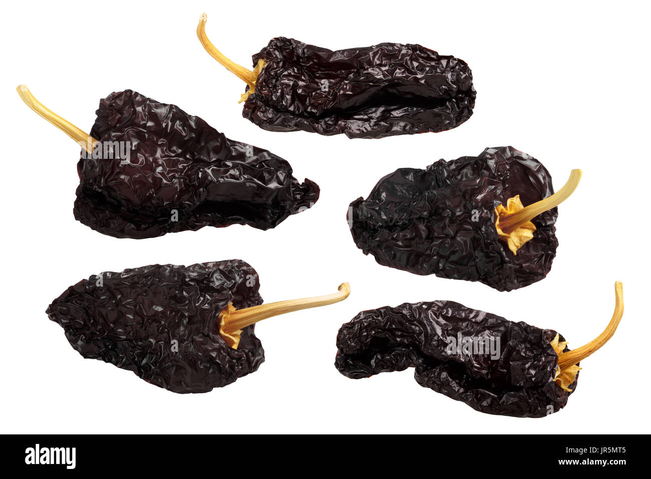 Ancho mulato - dark dried Poblano chile peppers, whole. Clipping path ...