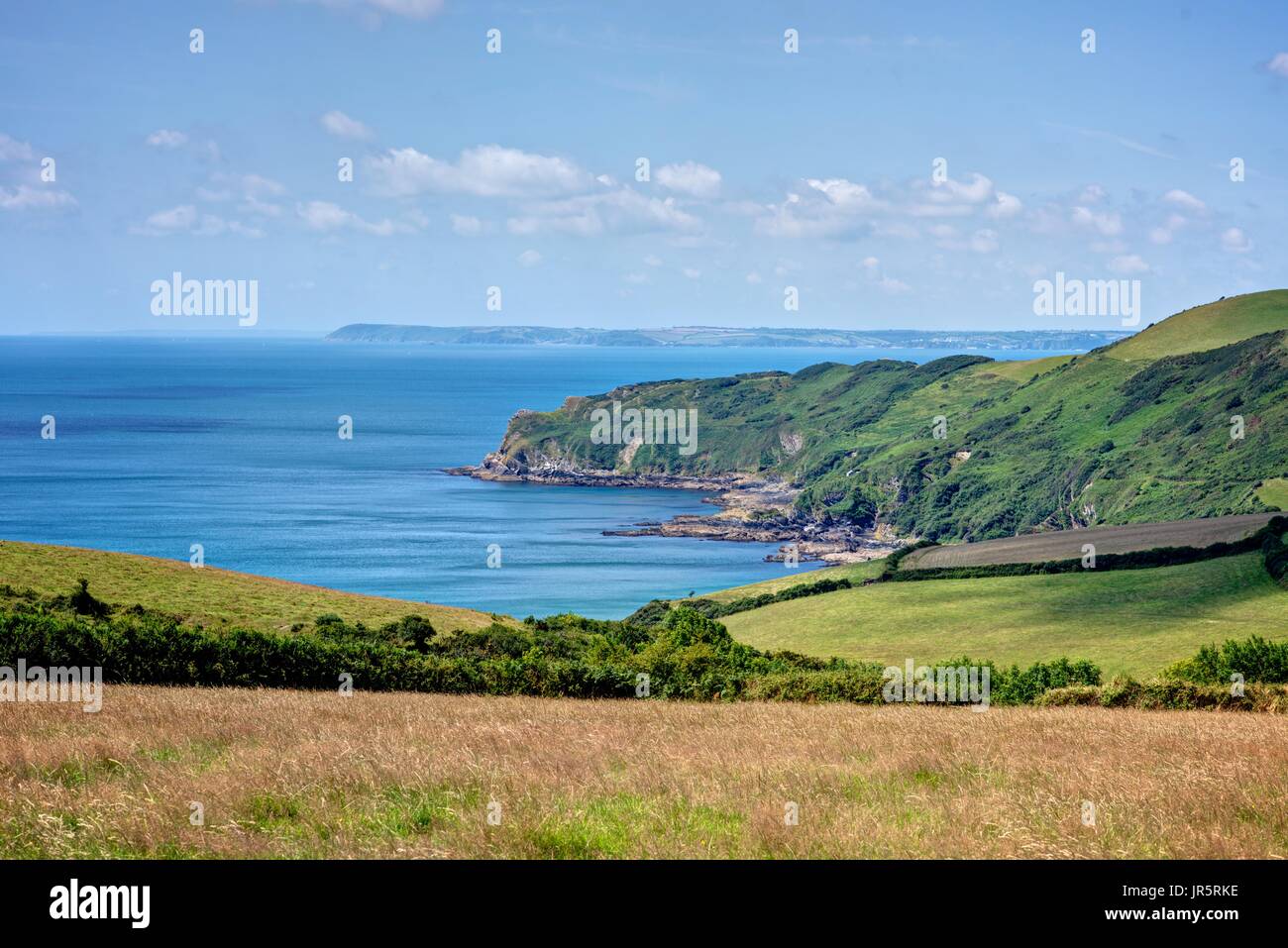 Far reaching views over Cornish farmland to the azure blue coastline ...