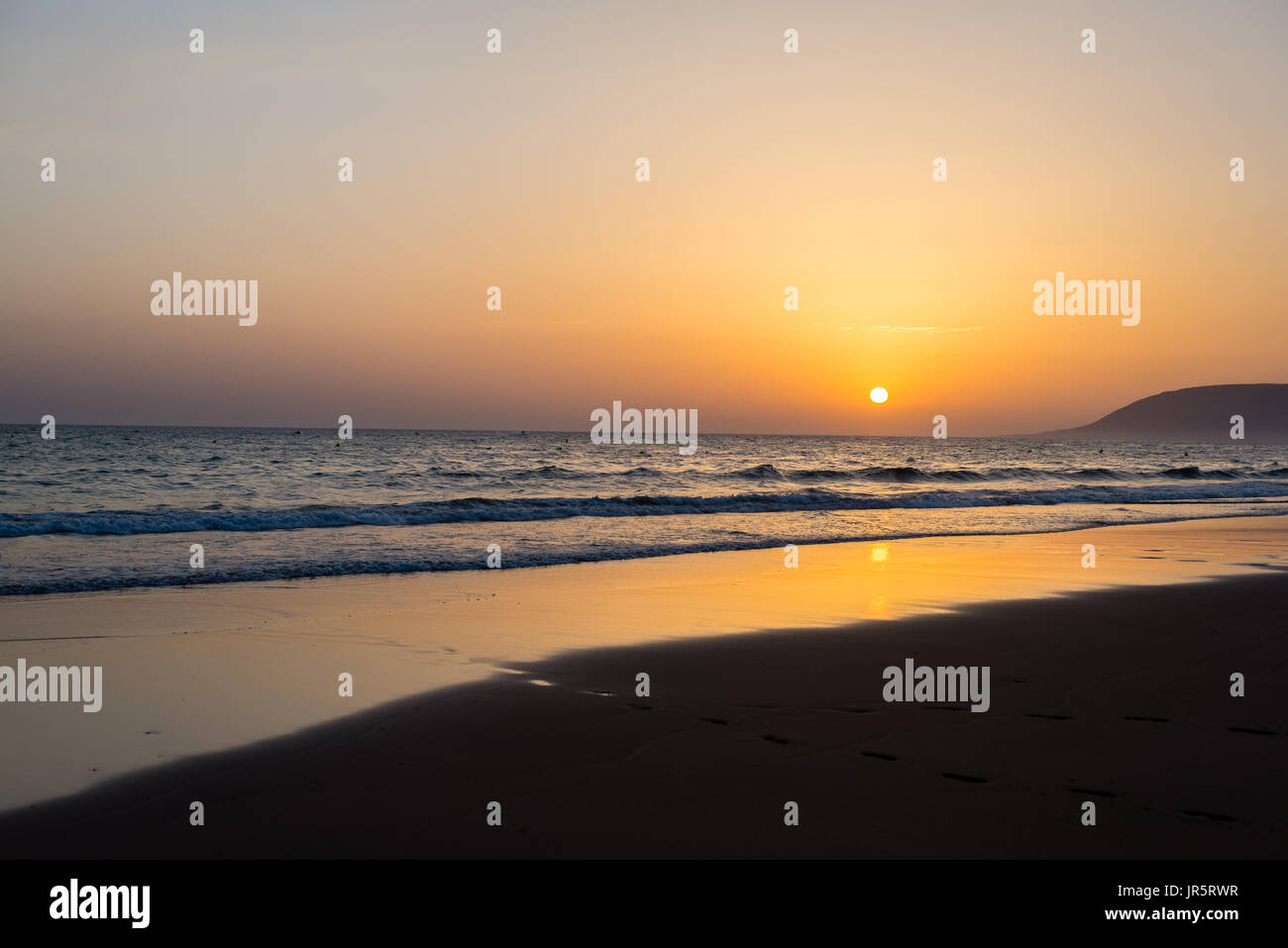 Beach at sunset, Agadir Morocco Stock Photo - Alamy