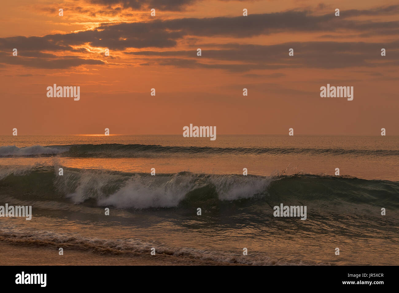 Beautiful sunset at cabo ledo beach Angola. With waves. Dramatic sky ...