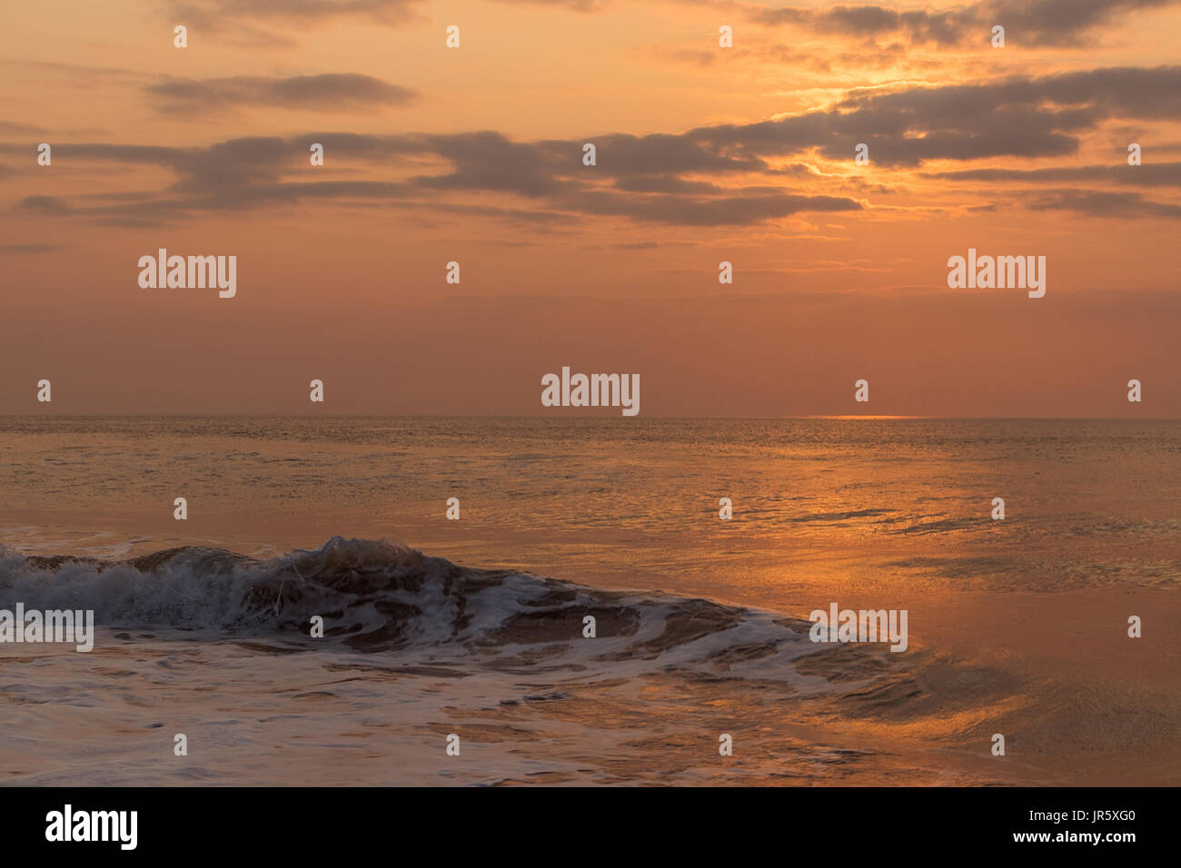 Beautiful sunset at cabo ledo beach Angola. With waves. Dramatic sky ...
