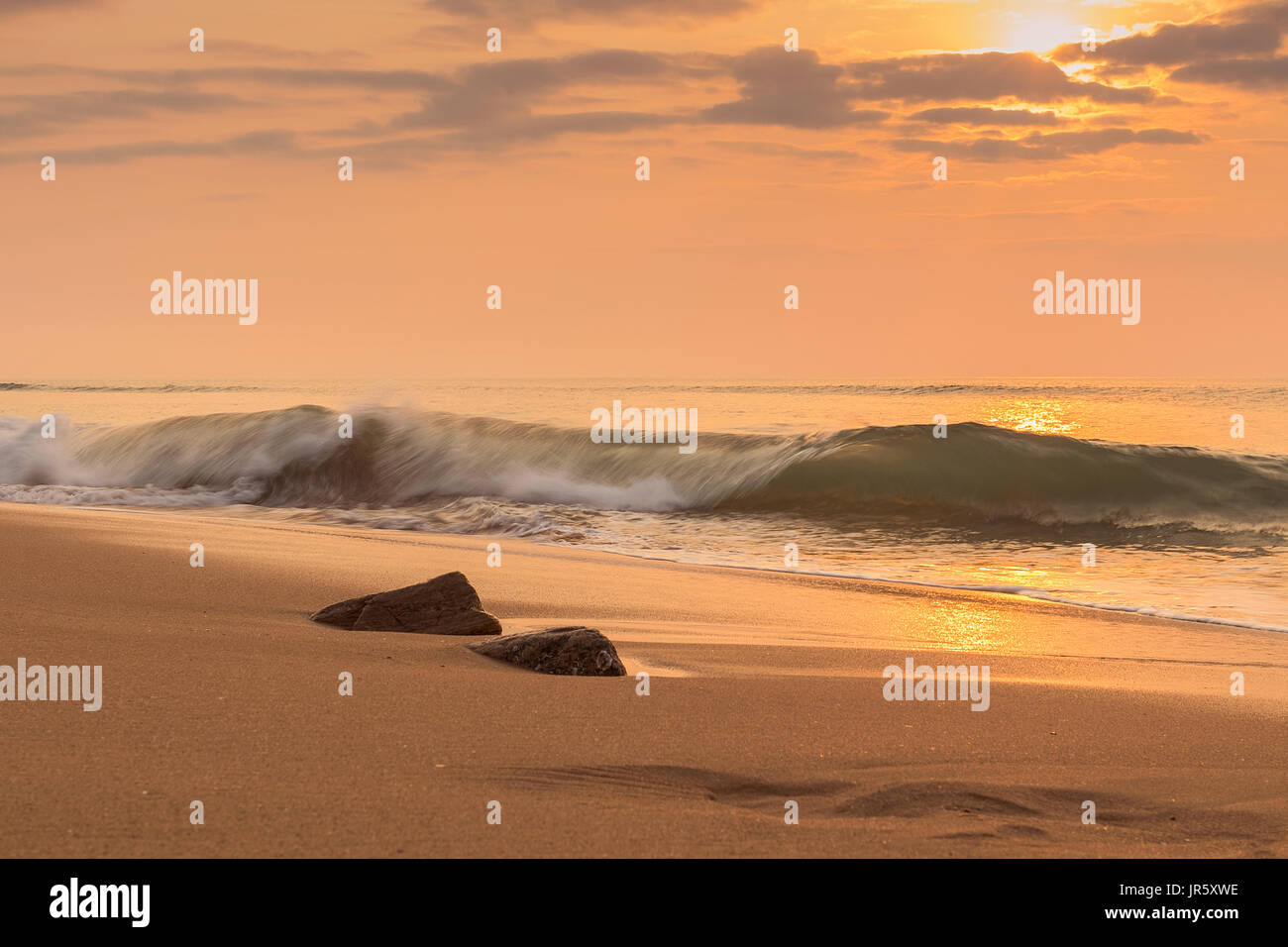 Beautiful sunset at cabo ledo beach Angola. With waves. Dramatic sky ...