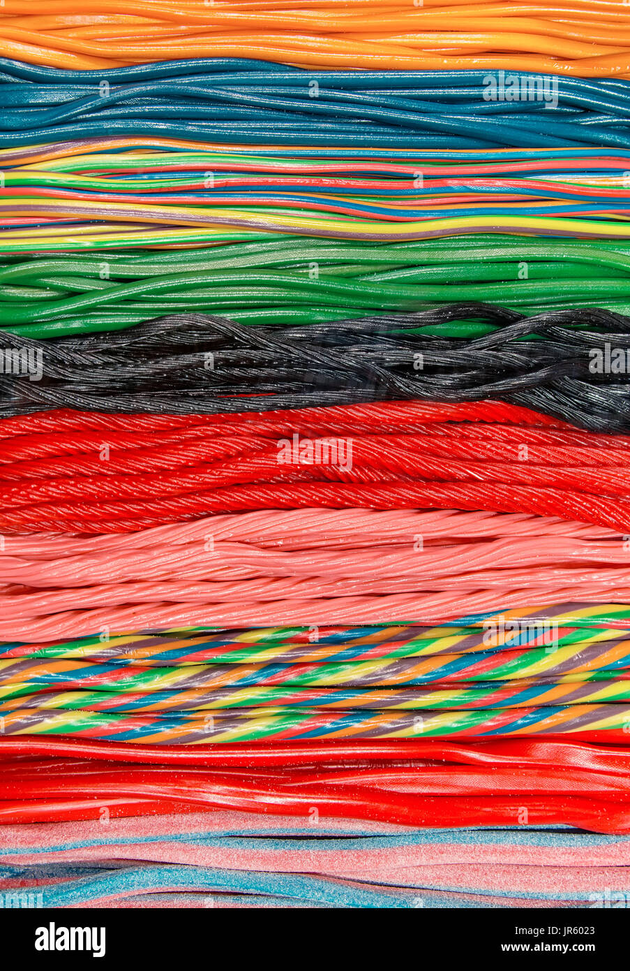 Long row of colorful rainbow soft licorice candy Stock Photo - Alamy