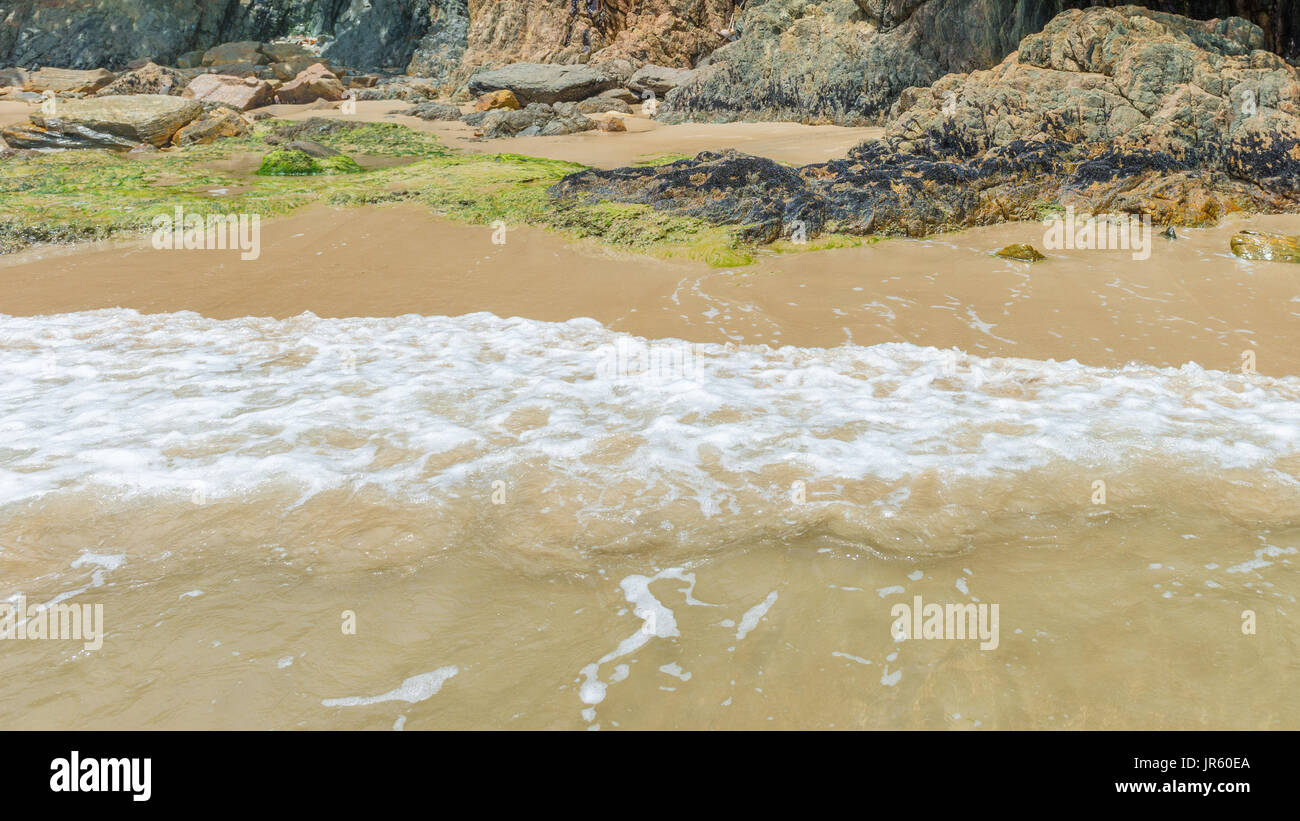 Water forms and effects all over the beach sand Stock Photo - Alamy