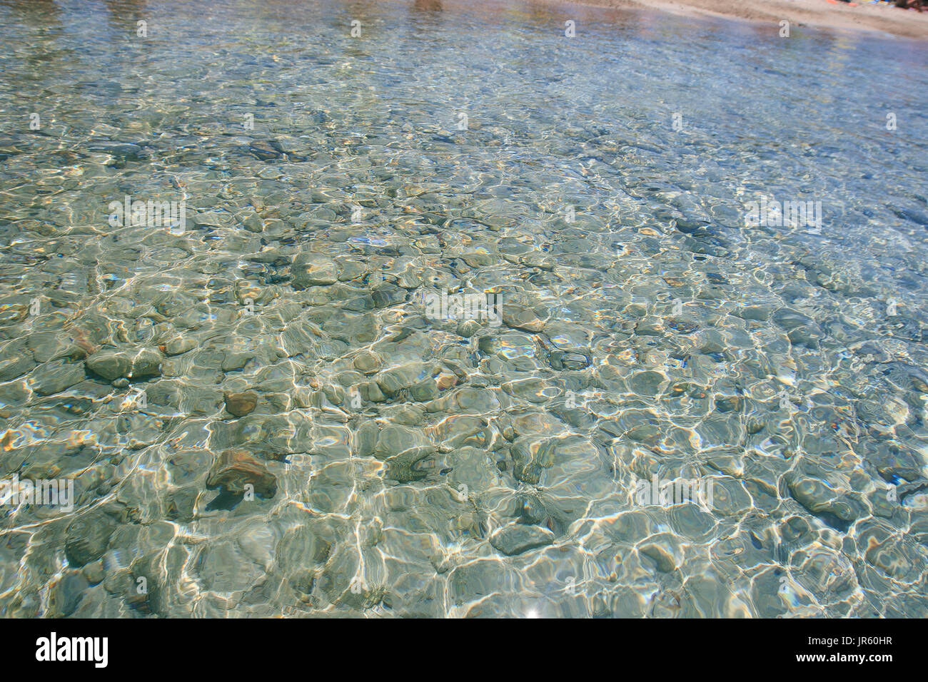 Very clear water a a Sardinia beach Stock Photo - Alamy