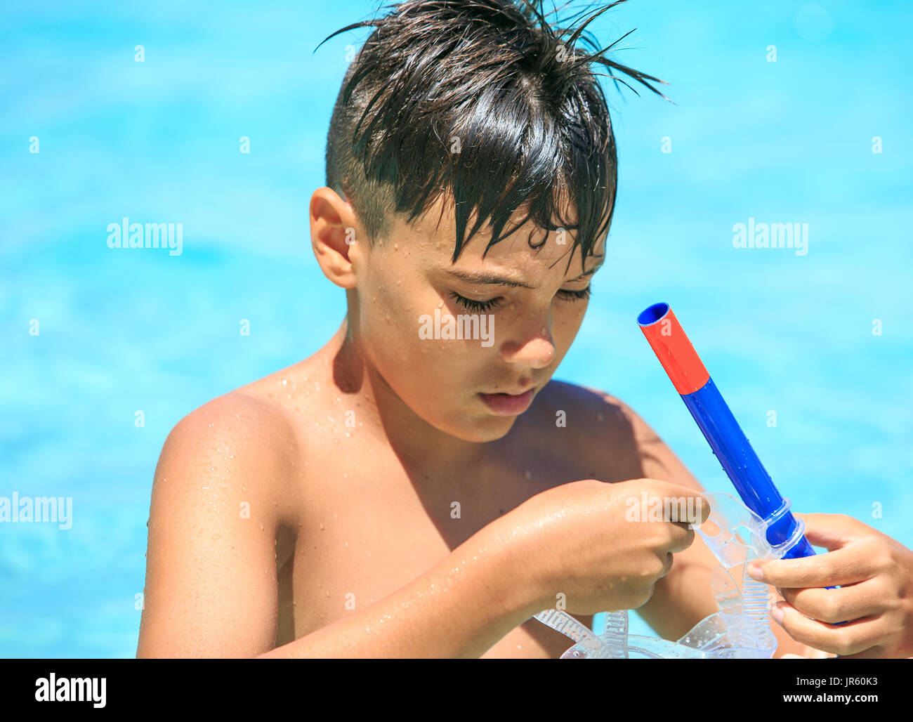 Boy with snorkeling mask Stock Photo - Alamy