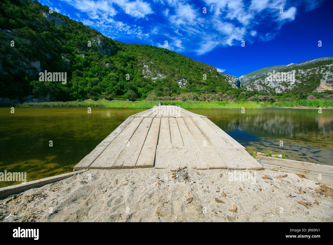 wooden foot bridge on a lake Stock Photo - Alamy