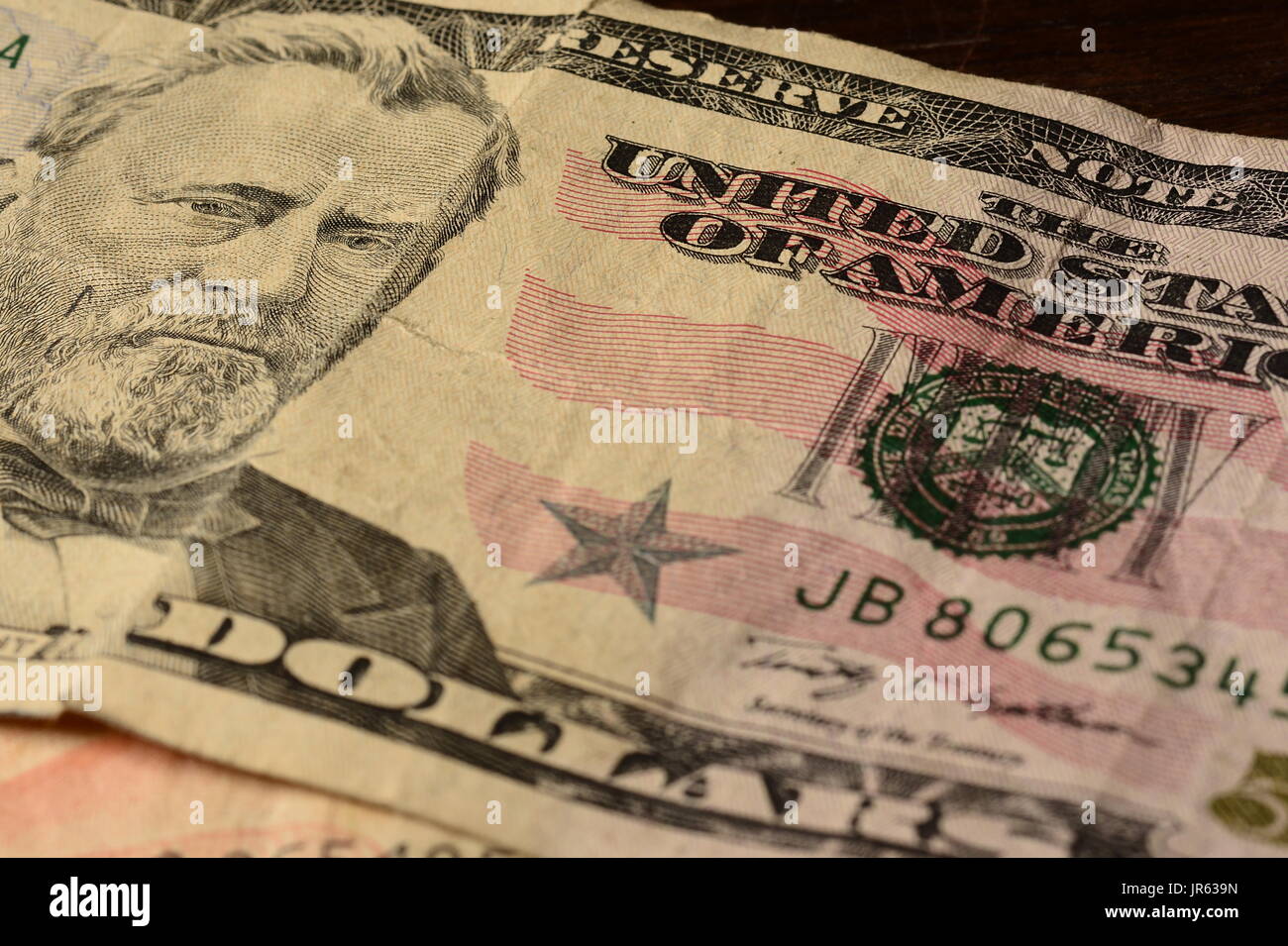 One Dollar bill note on a table Stock Photo - Alamy