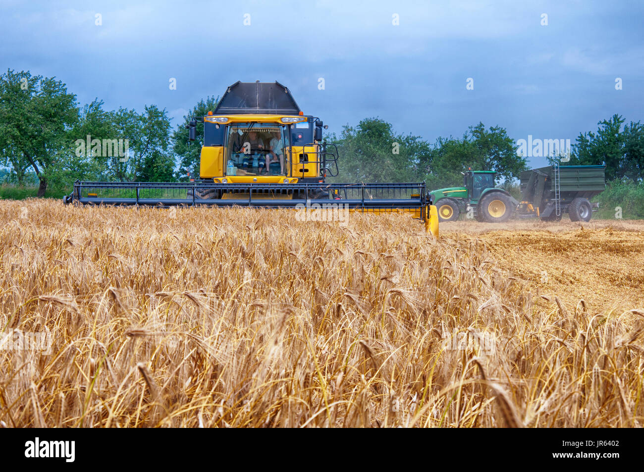 Agricultural combine harvester on industrial hi-res stock photography ...