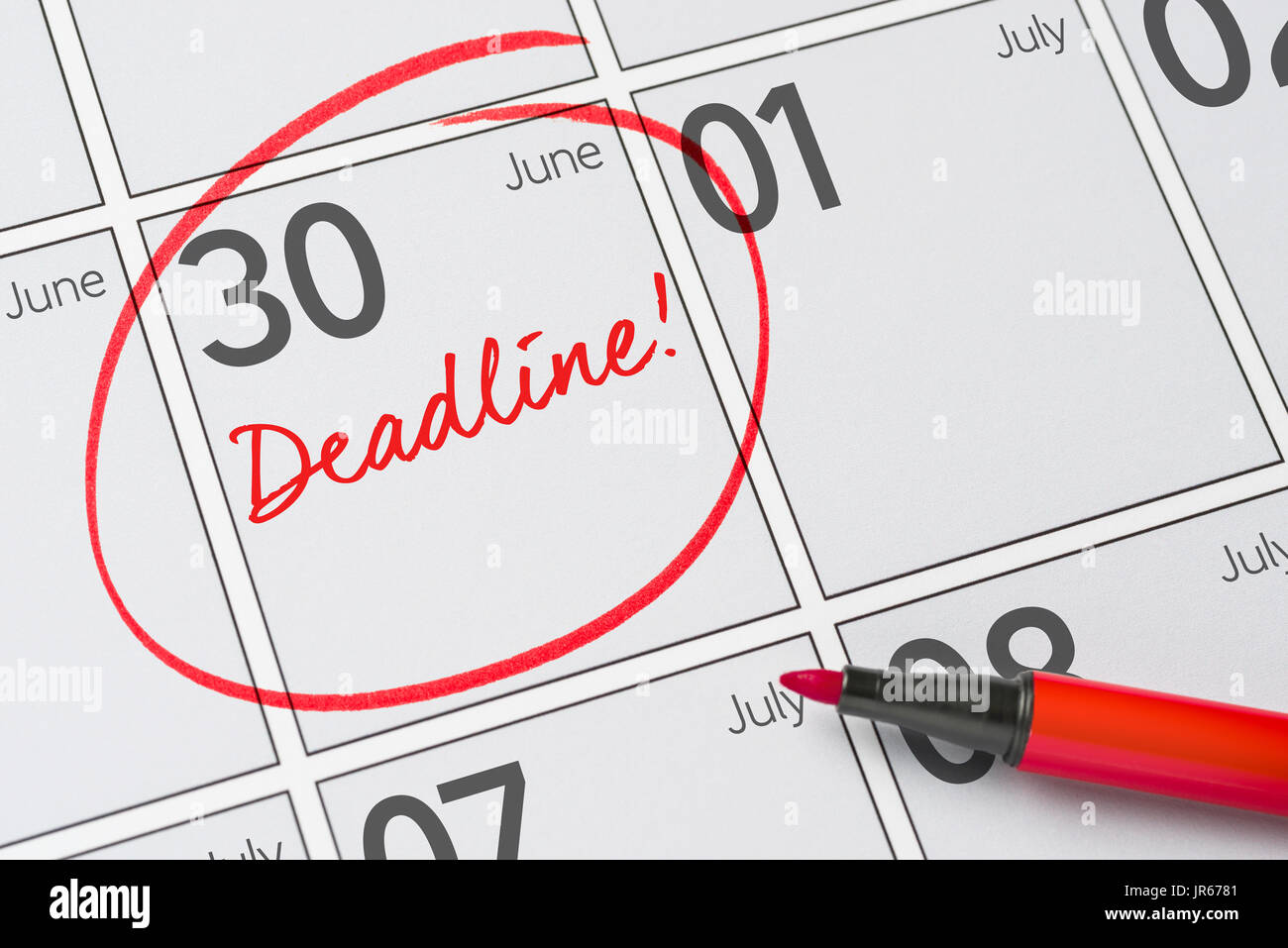 Deadline written on a calendar - June 30 Stock Photo - Alamy