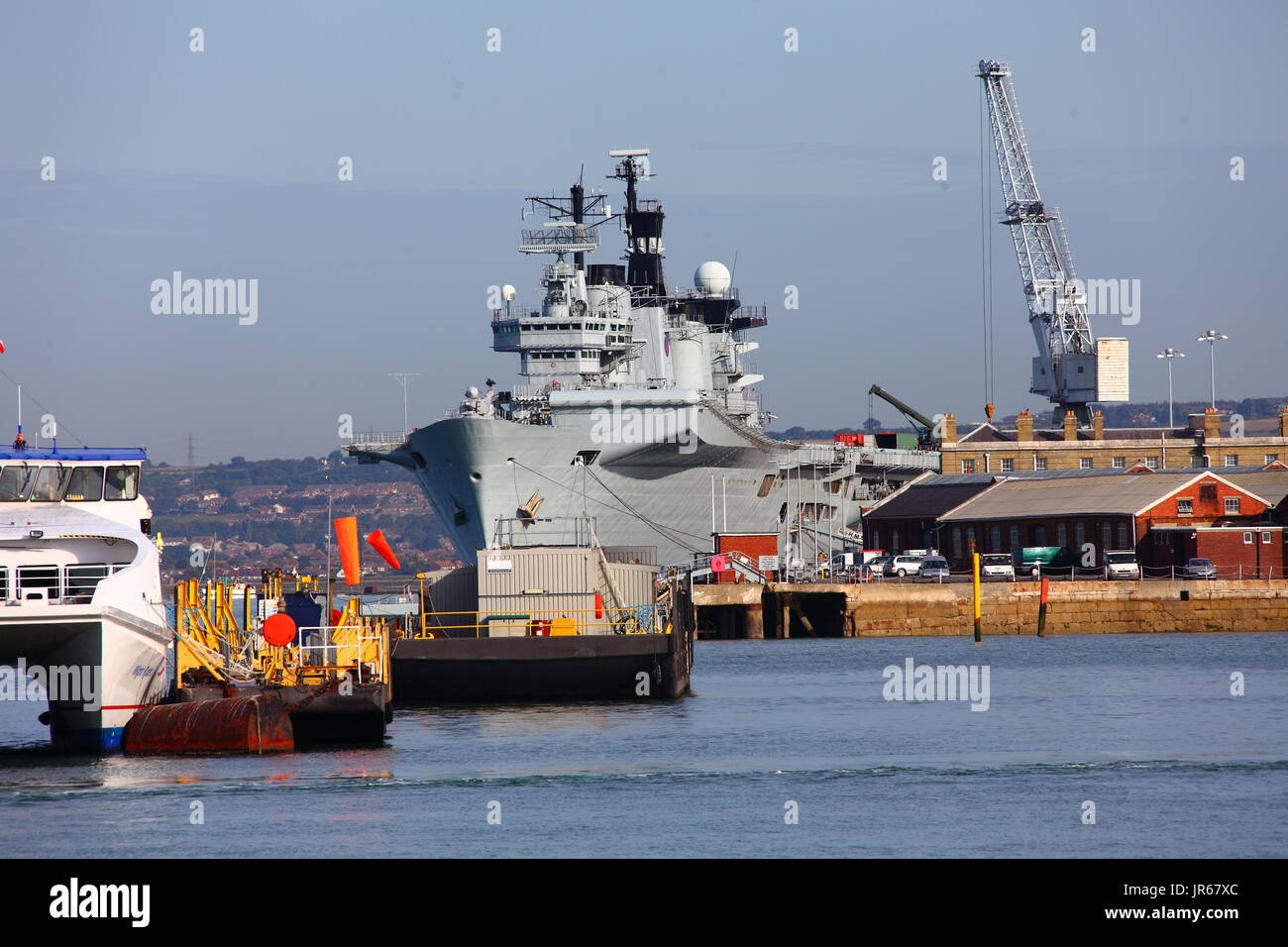 Royal Navy light aircraft carrier HMS Illustrious in Portsmouth Harbour ...