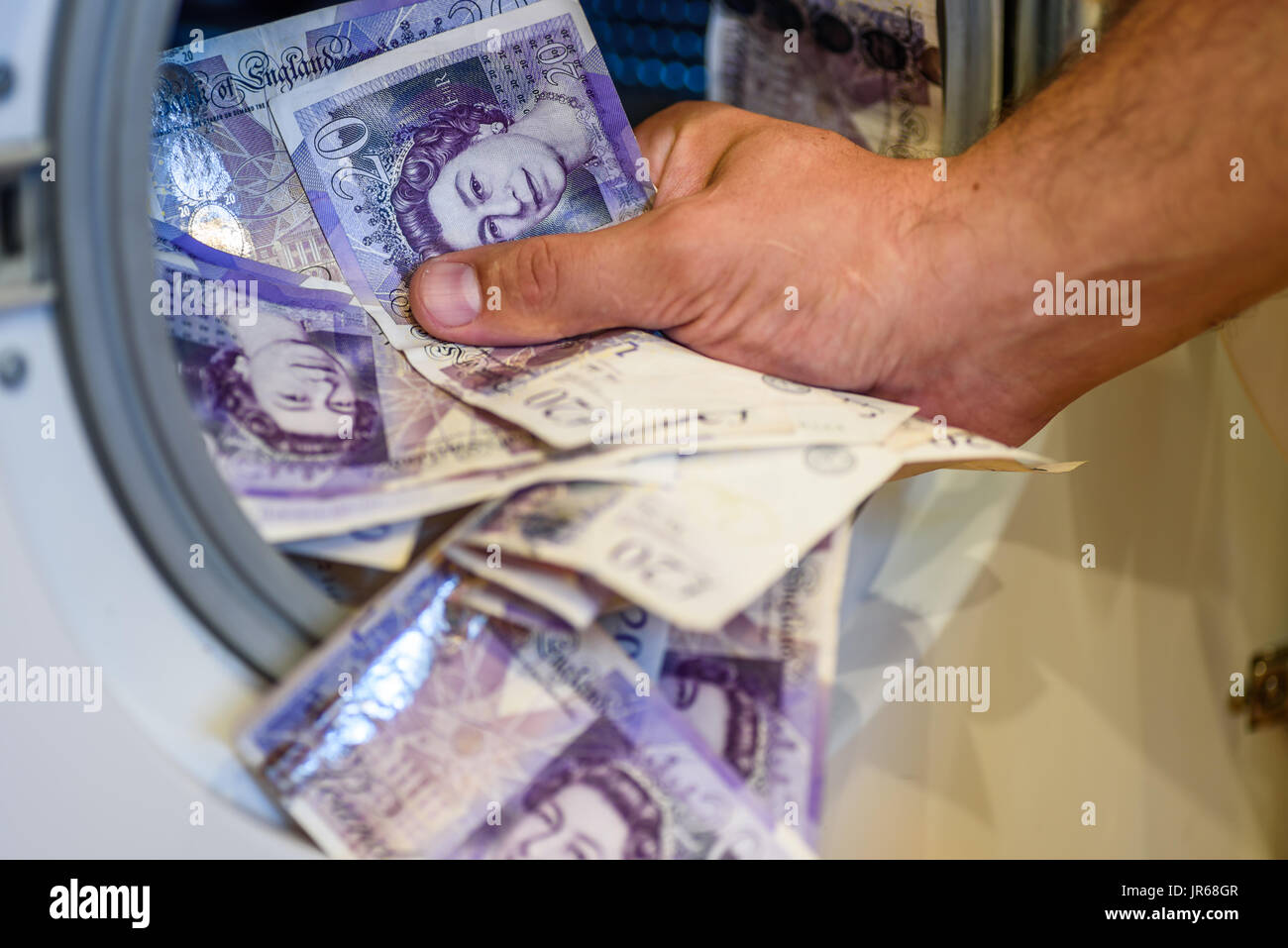 Money hanging out dry hi-res stock photography and images - Alamy