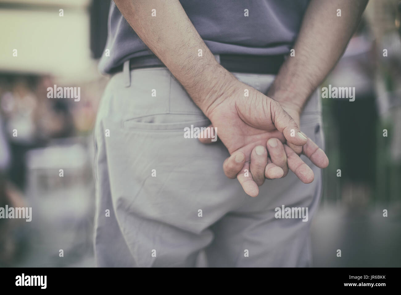 Man Hands Behind Back Stock Photos & Man Hands Behind Back Stock Images ...