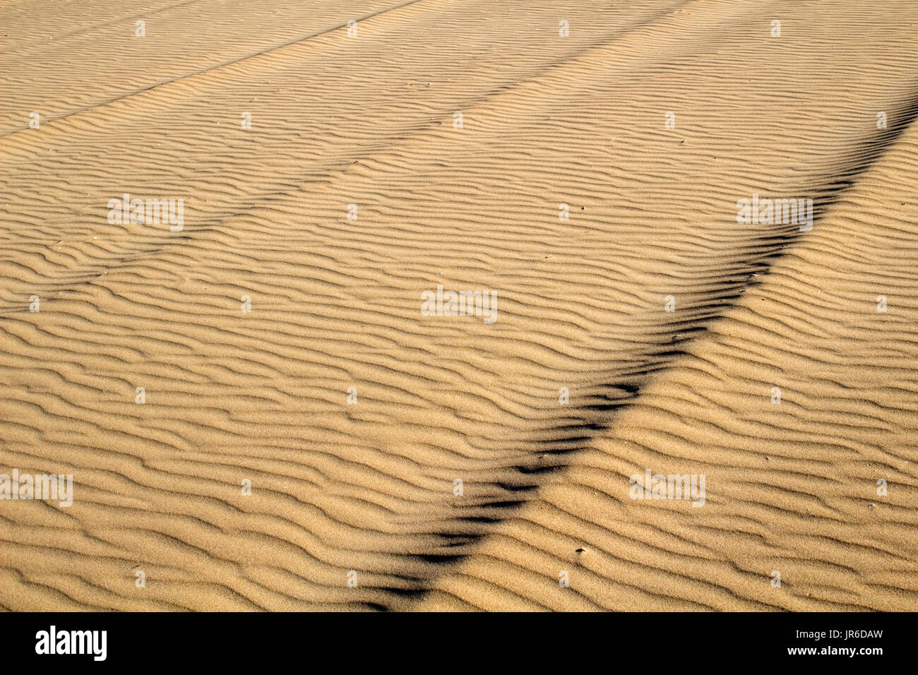 Close-up image showing patterns in the sand Stock Photo - Alamy