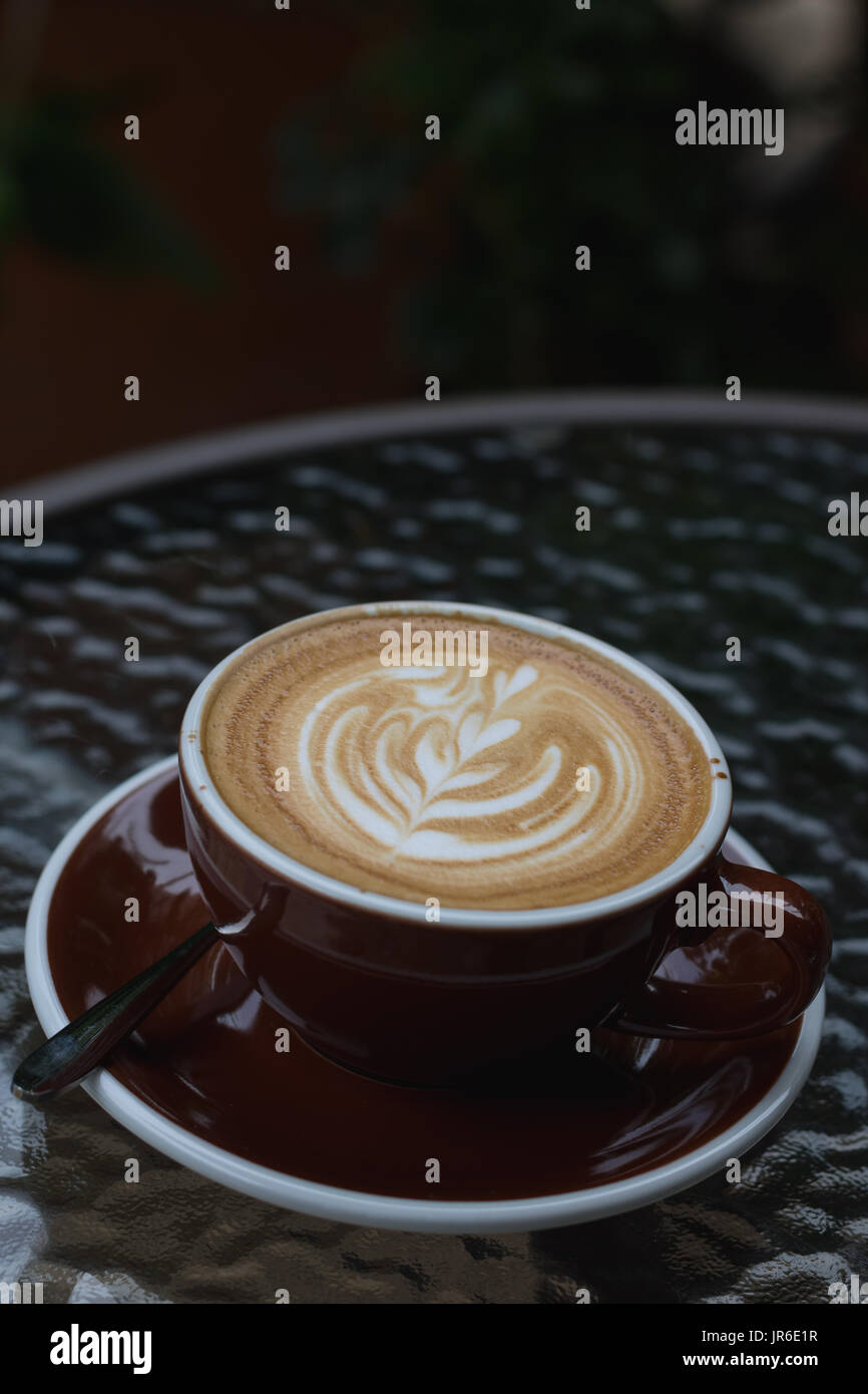 Hot coffee latte with beautiful latte art Stock Photo - Alamy