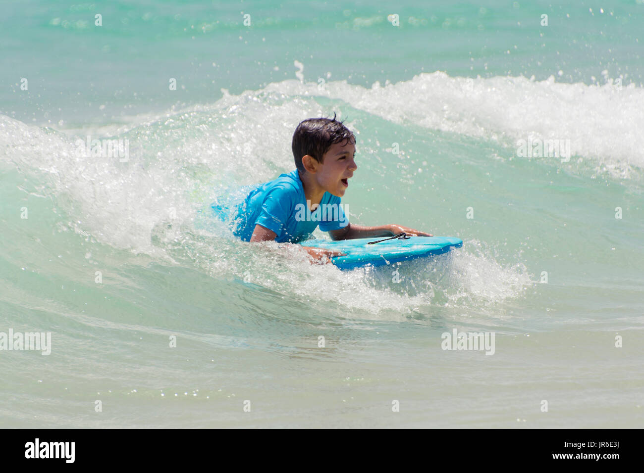 Children with boogie board hi-res stock photography and images - Alamy