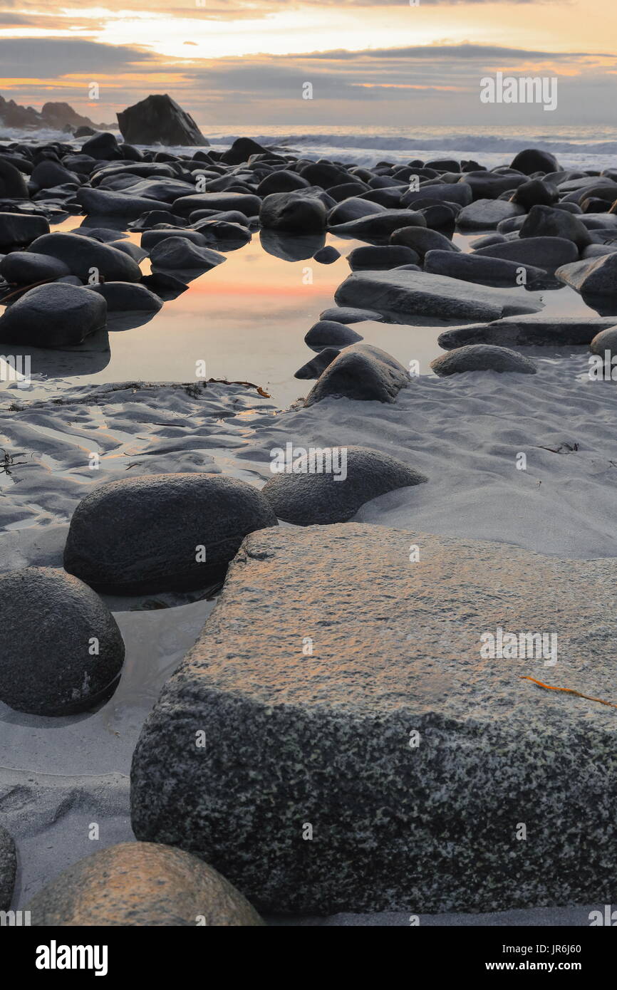Utakleiv beach-NWwards view to the open ocean over the big boulders of ...