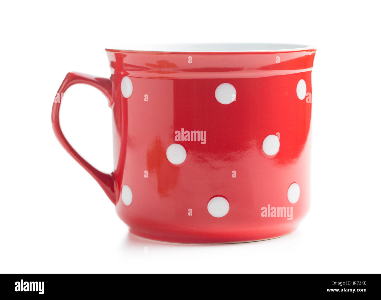 Red and white spotted mug isolated on white background Stock Photo - Alamy