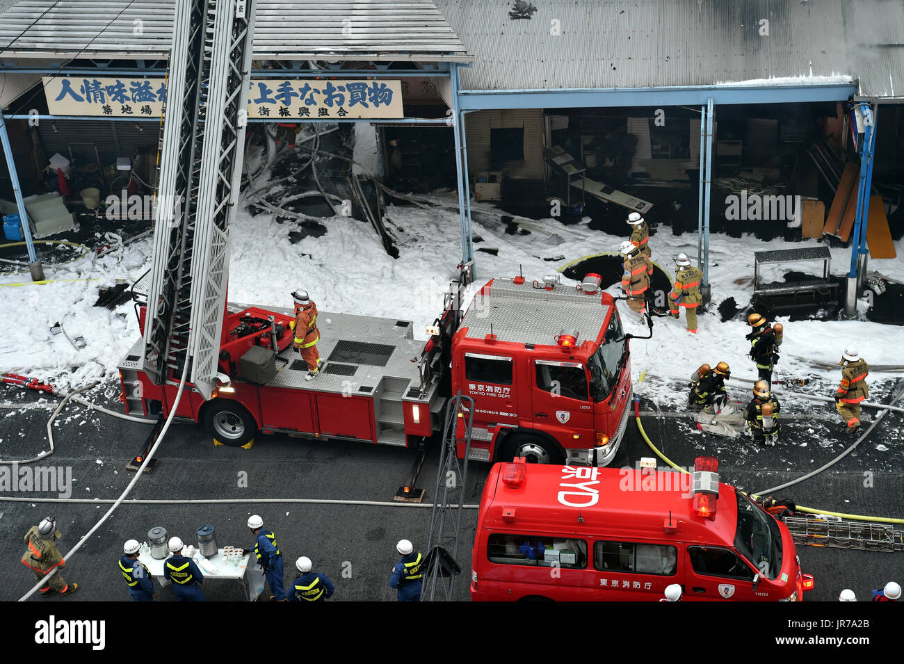 Tokyo, Japan. 3rd Aug, 2017. Firefighters battle a blaze after a fire ...