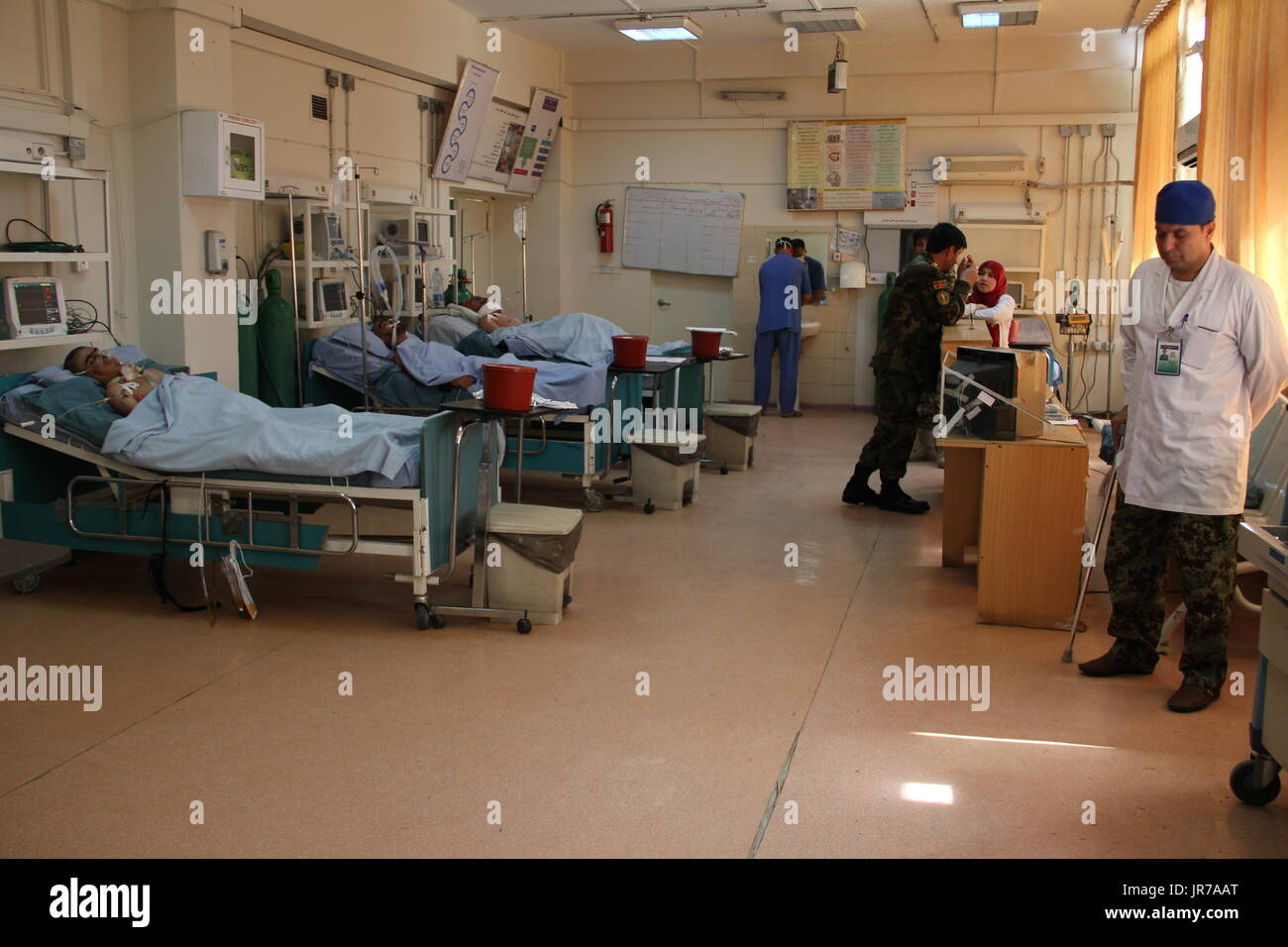 Patients lying on beds in the intensive care wing of the largest ...