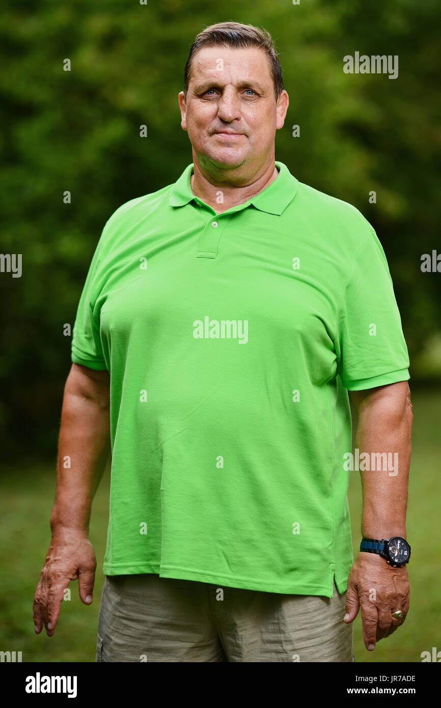 Reilingen, Germany. 3rd Aug, 2017. Retired wrestler Uwe Neupert poses ...