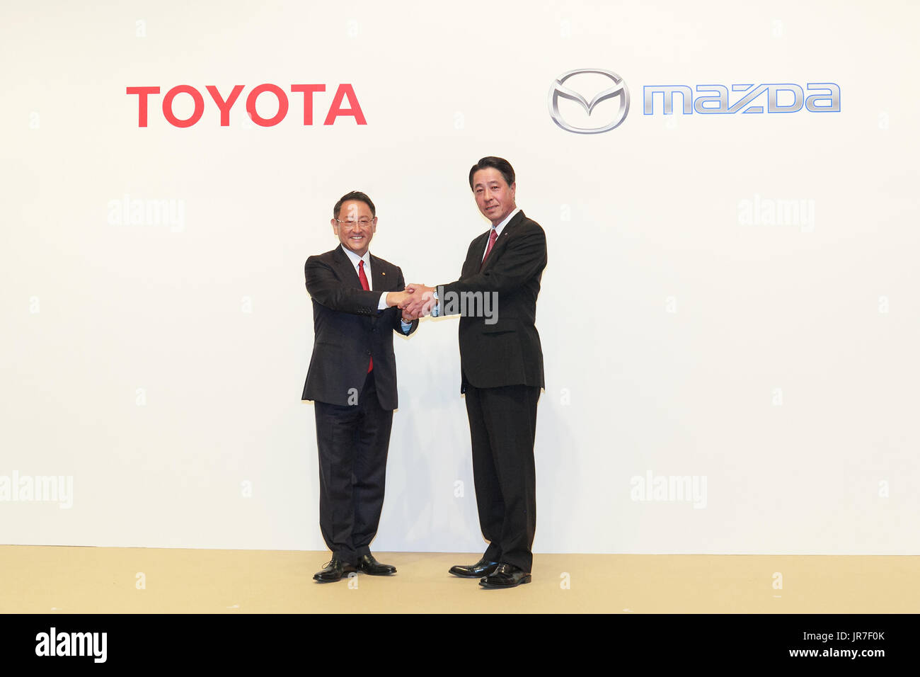 (L to R) Toyota Motor Corporation President Akio Toyoda and Mazda Motor ...