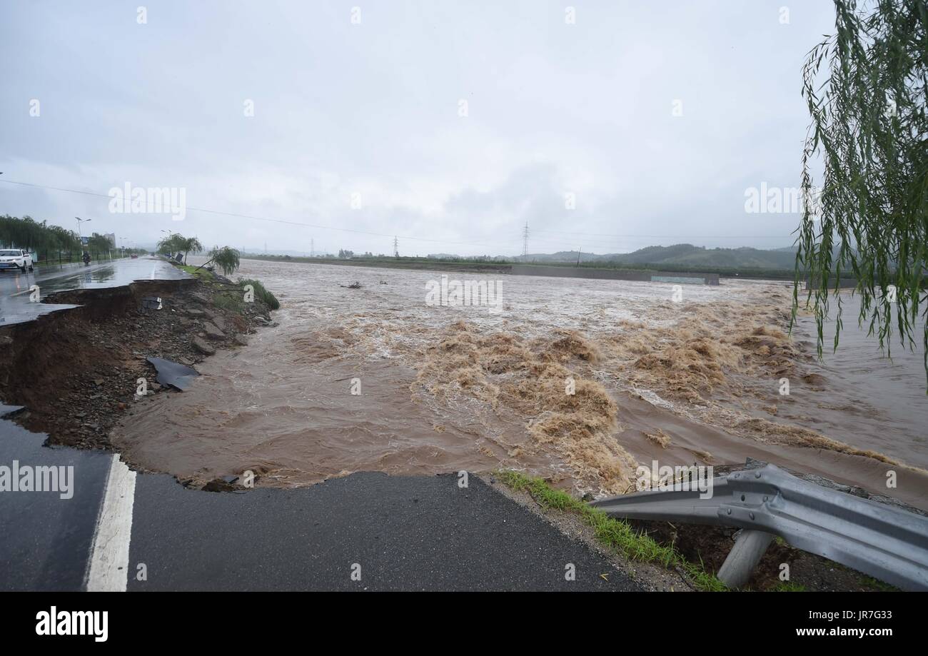Xiuyan. 4th Aug, 2017. Photo taken on Aug. 4, 2017 shows a damaged road ...