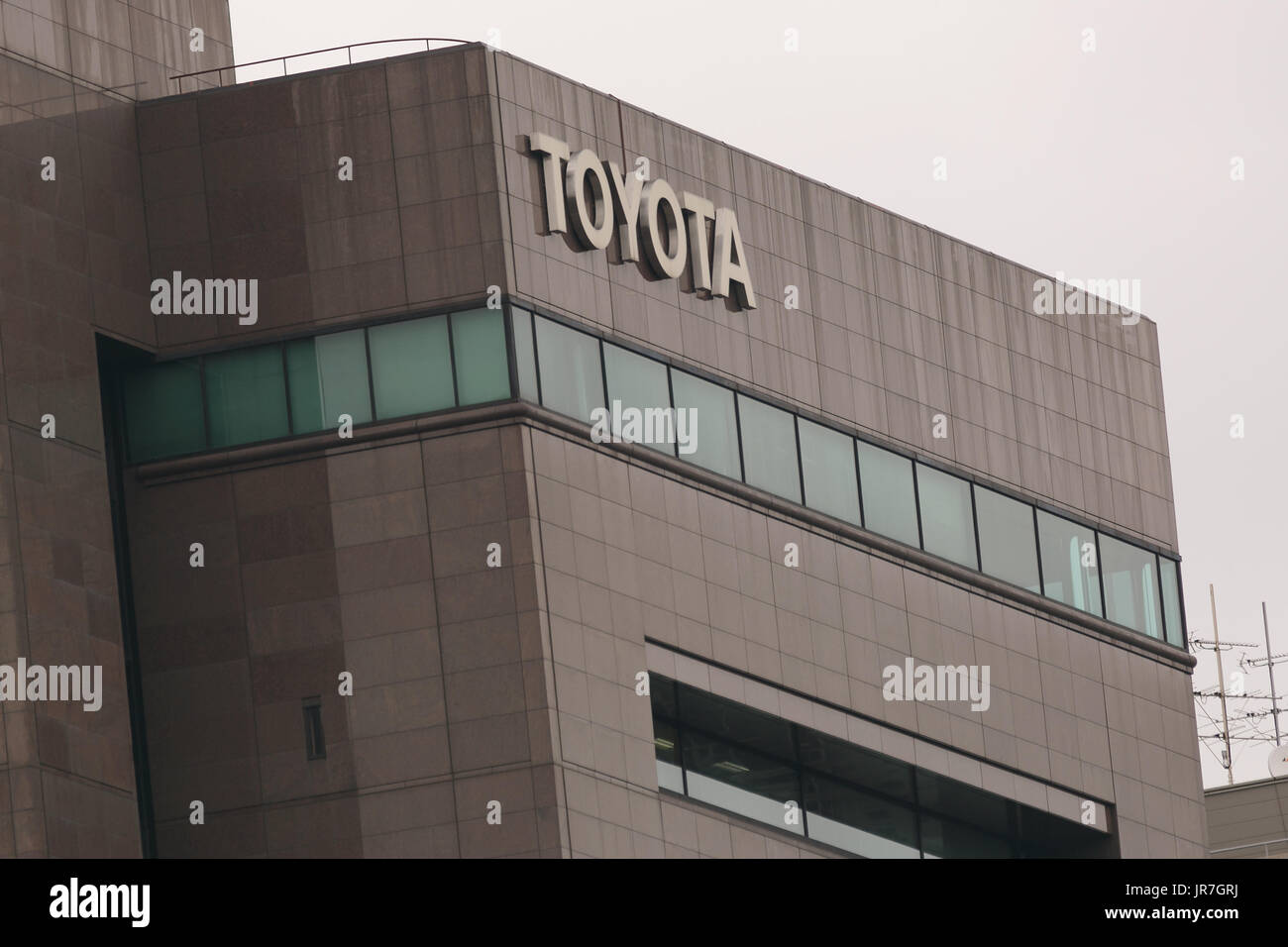 A Toyota Motor Corporation (TMC) signboard on display outside its ...