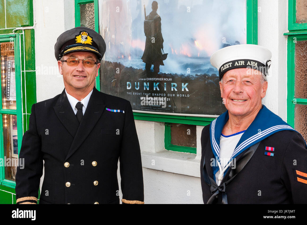 England, Sandwich. Two men dressed in world war two navy uniforms, one ...
