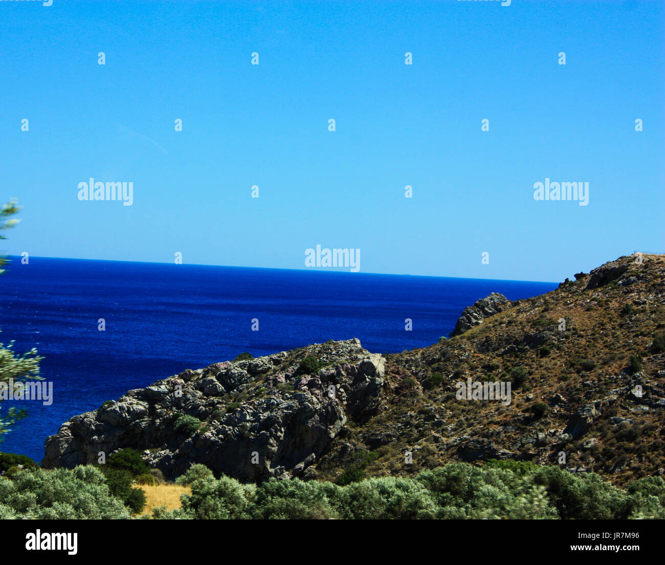 Cretan sea wild coastline and countryside with a blue sky Stock Photo ...
