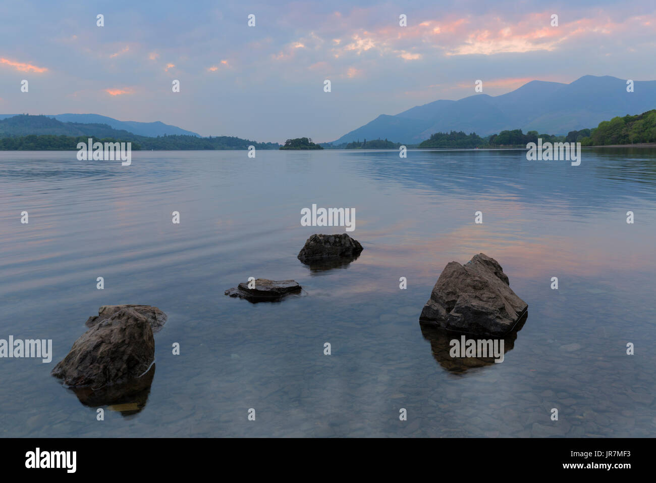 Sundown over Derwent Water in the Lake District in Cumbria Stock Photo ...