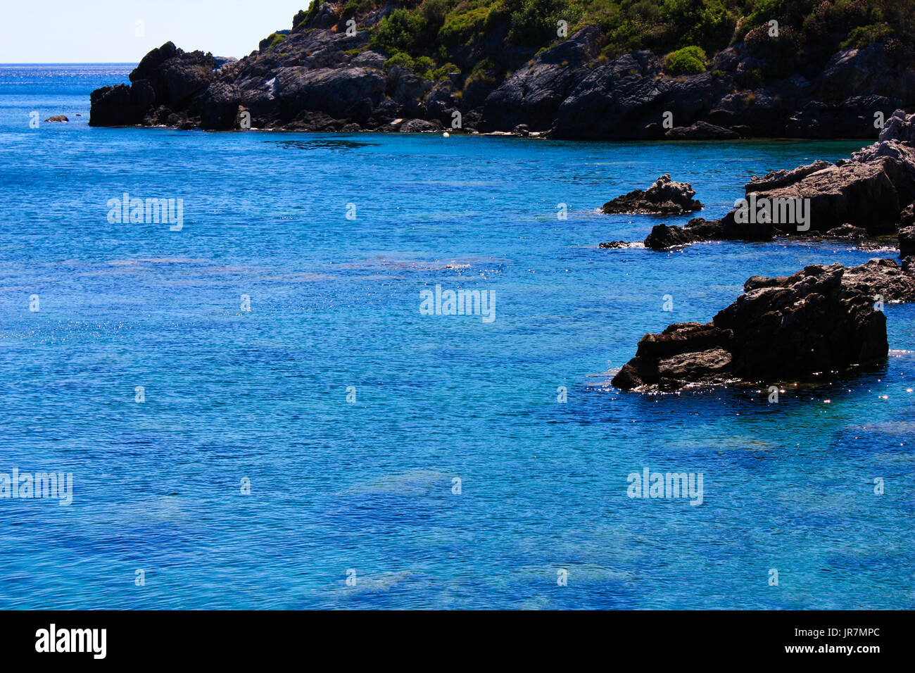 Cretan sea wild coastline and countryside with a blue sky Stock Photo ...