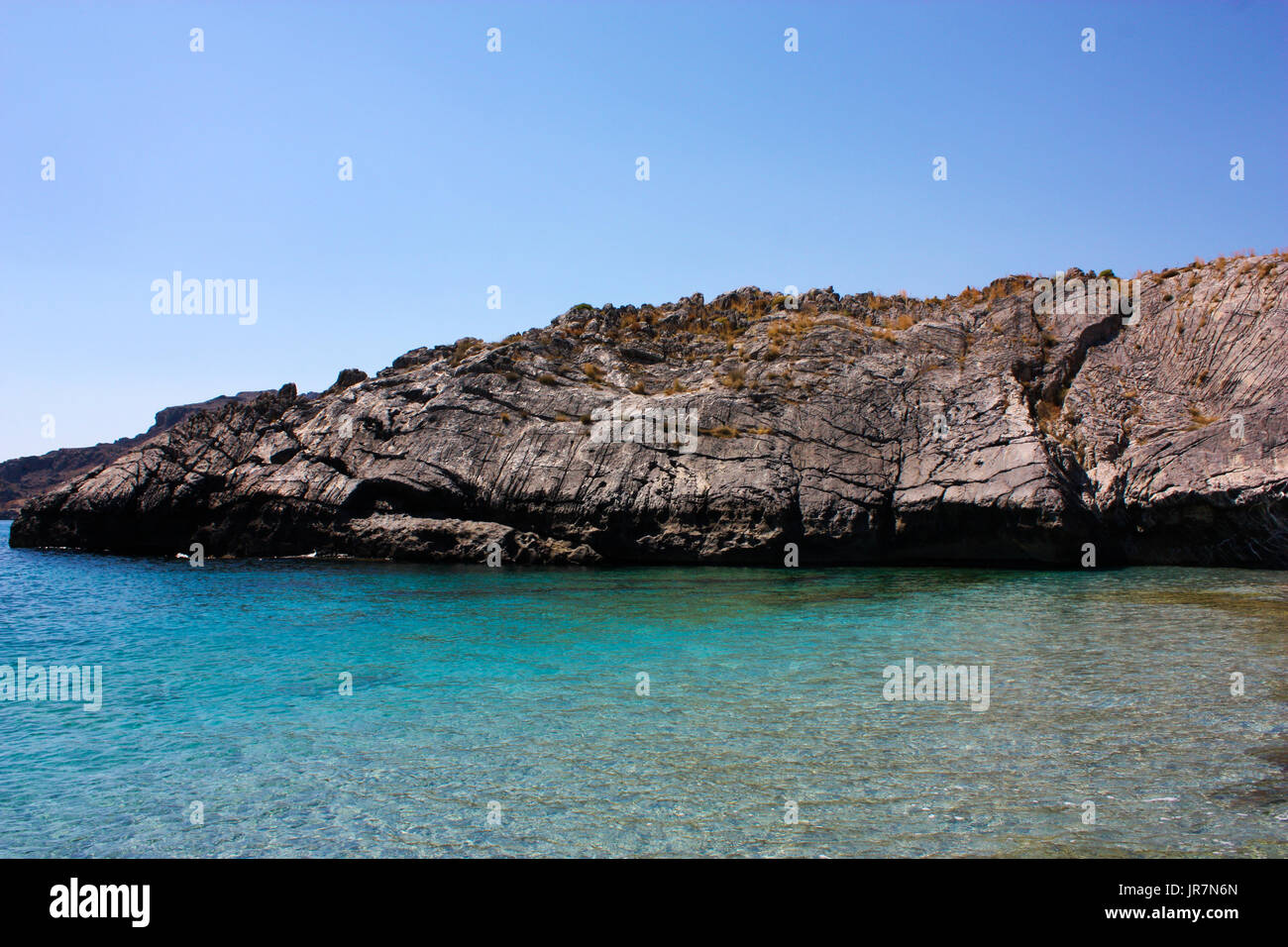 Cretan sea wild coastline and countryside with a blue sky Stock Photo ...