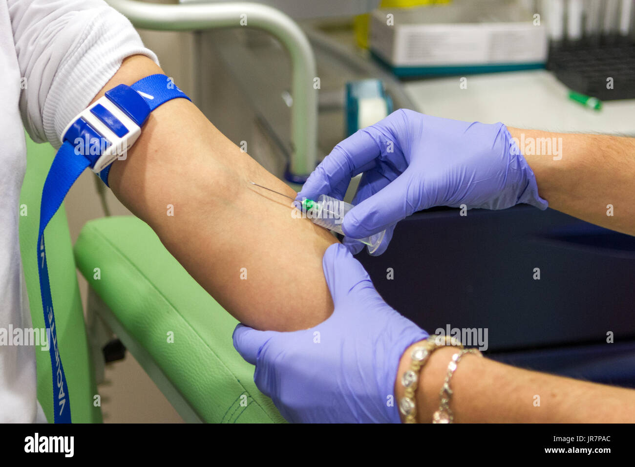Zagreb, Croatia - June 14, 2017: Hands of female doctor taking blood ...
