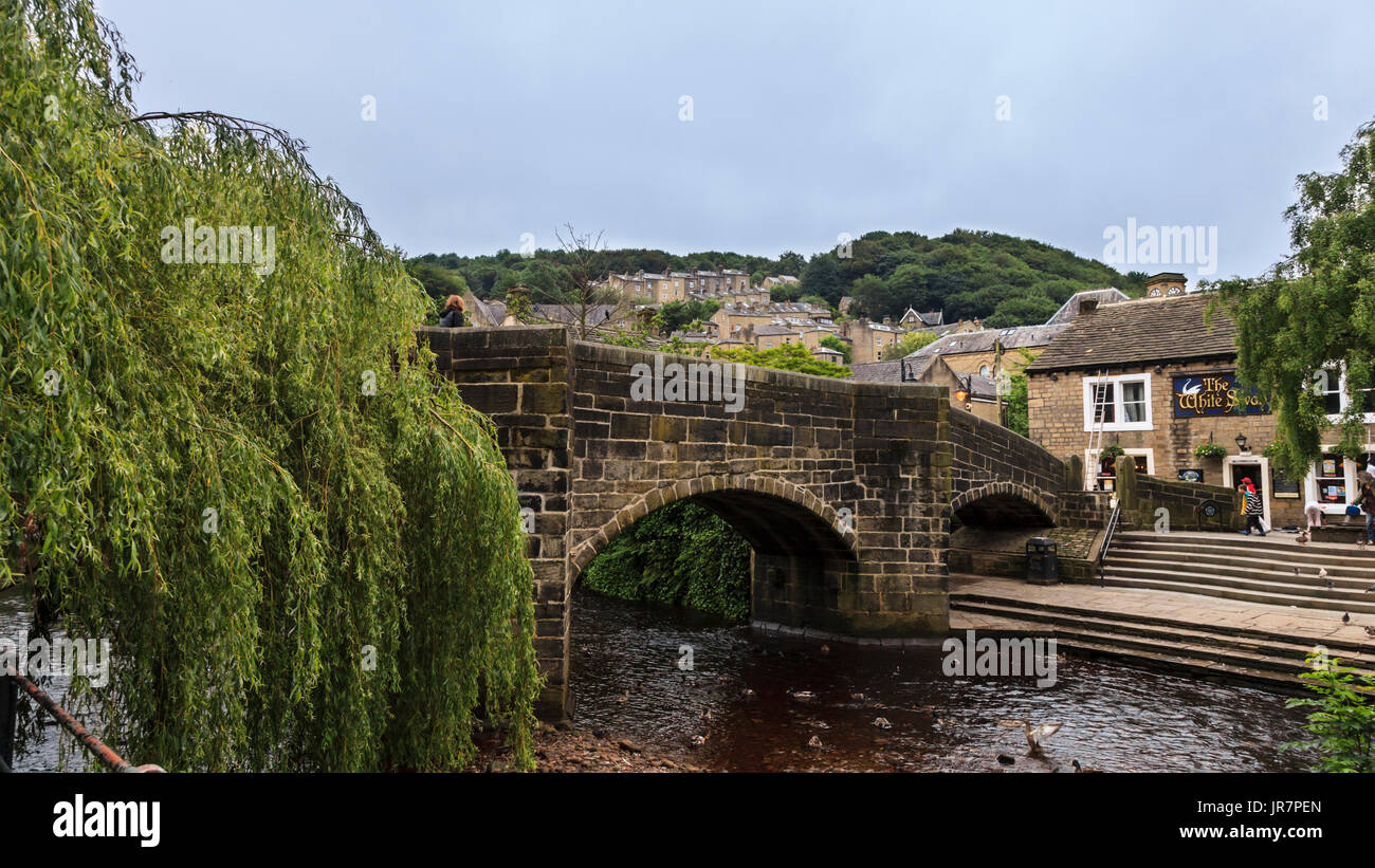The ancient Packhorse bridge in the centre of Hebden Bridge, West ...