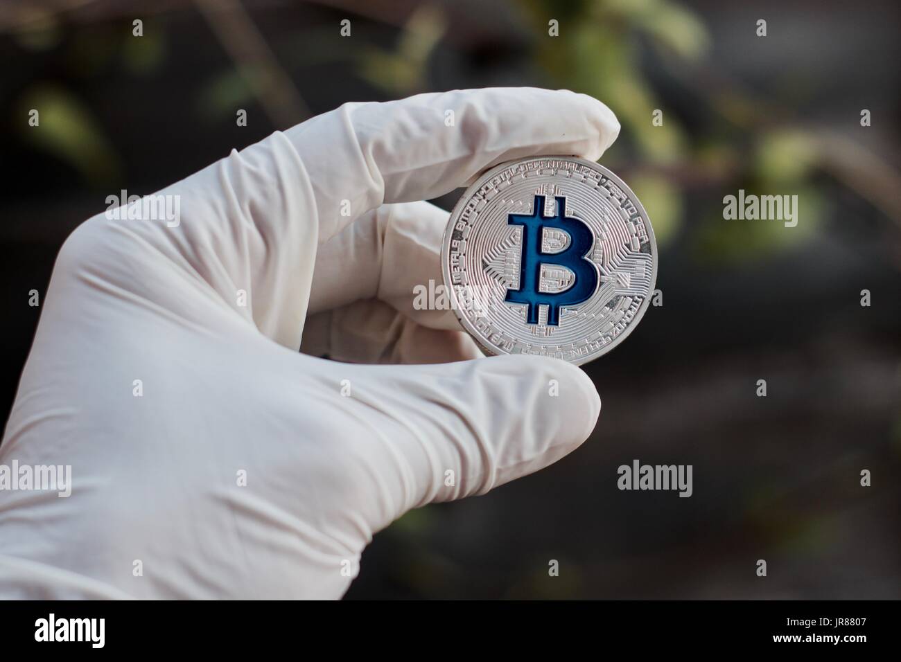 Digital currency physical metal bitcoin coin. Virtual money concept ...