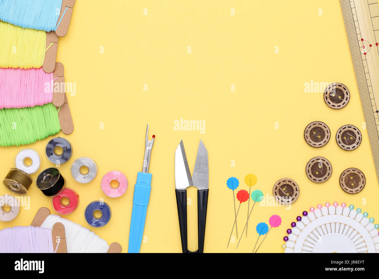 sewing tools, tailoring and fashion concept - close-up on yellow ...