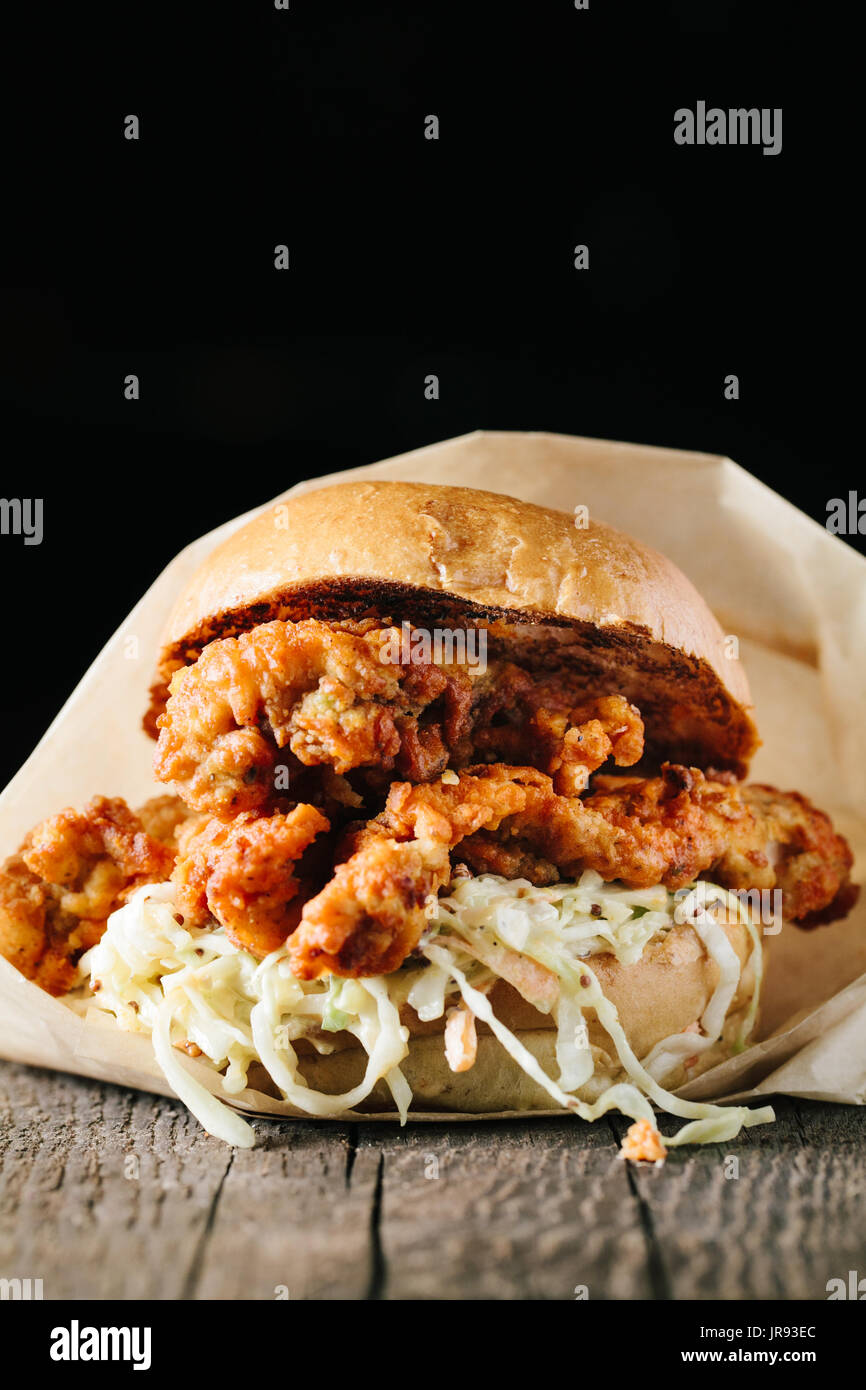 Southern style fried crispy chicken sandwich on dark background Stock ...