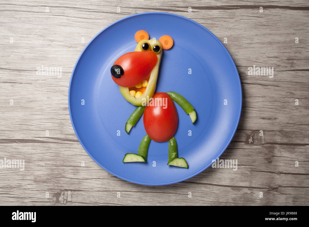 Bear made of raw vegetables on plate and board Stock Photo - Alamy