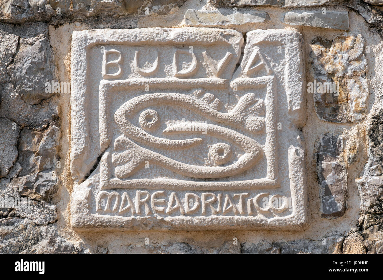 Historic symbol of Budva on wall of the ancient Citadel in the Old City ...