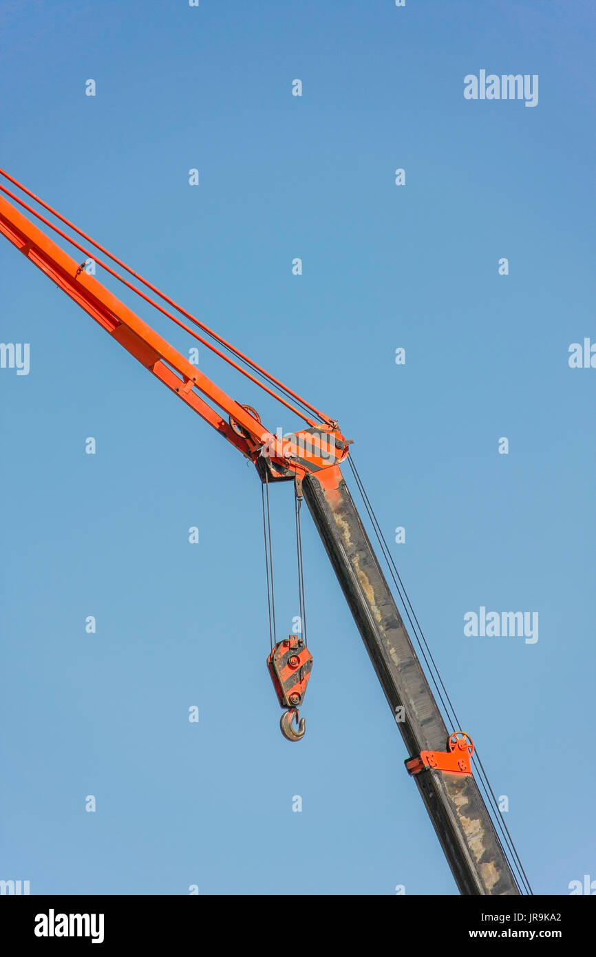 Crane hand machine with hanger for take heavy construction materials to ...