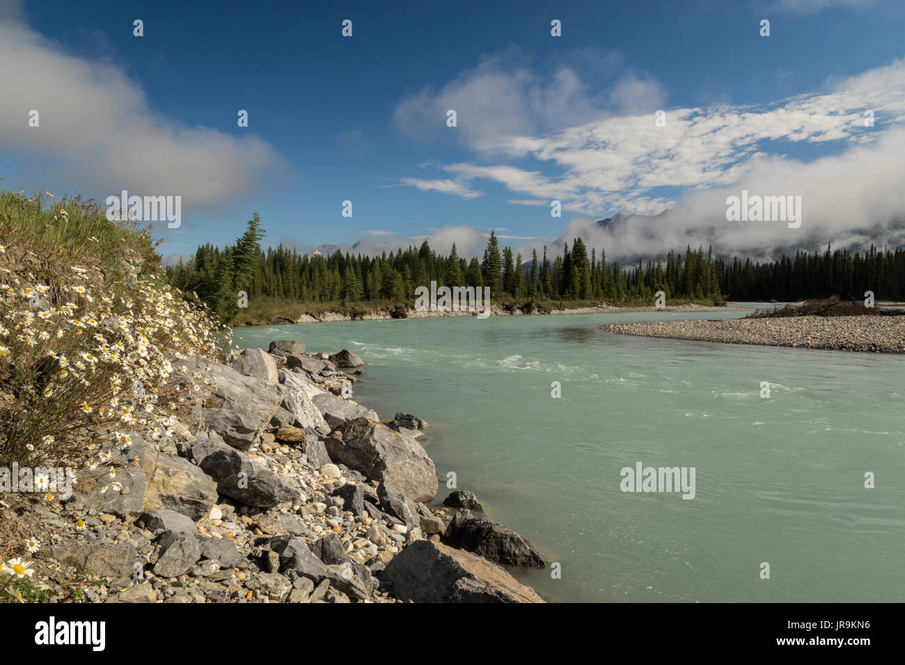 Glacial waters flowing down the river Stock Photo - Alamy