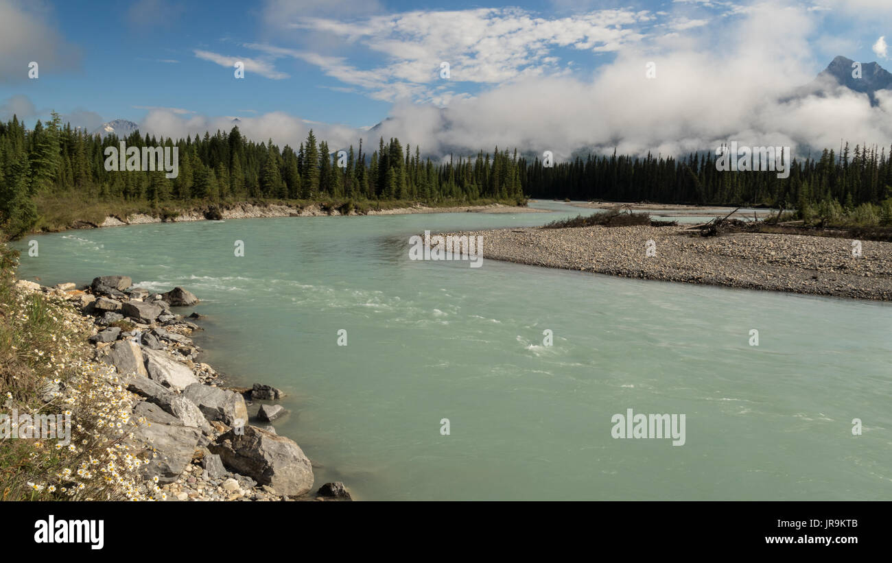 Turquoise blue waters running down the river Stock Photo - Alamy
