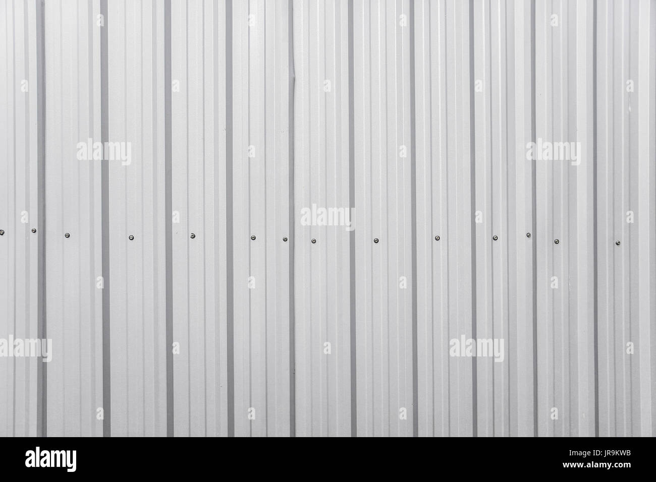 pattern silver metal sheet roof, wall with nut for industry background ...