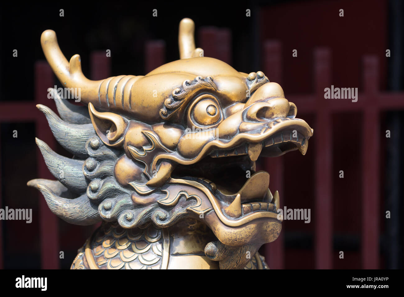 Bronze dragon head sculture at the entrance of a buddhist temple Stock ...